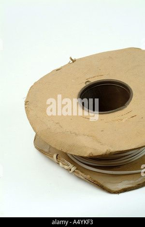 old telephone cable reel on white background Stock Photo - Alamy