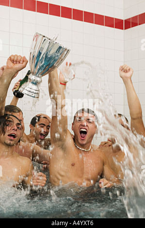 Asian football player man in a blue jersey celebrates the victory on ...