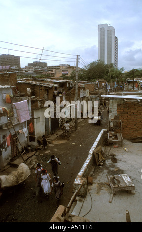 A contrast of urban life next to IFCI towers at Nehru Place New Stock ...