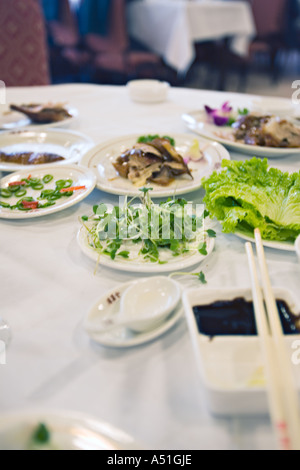 Sliced Peking Duck served with fresh cucumber, green onions, cilantro ...
