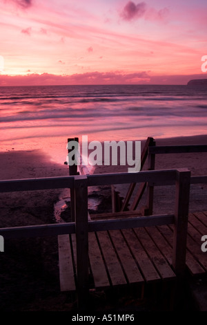 Sunset on Compton Beach wooden steps to beach Isle of Wight England ...