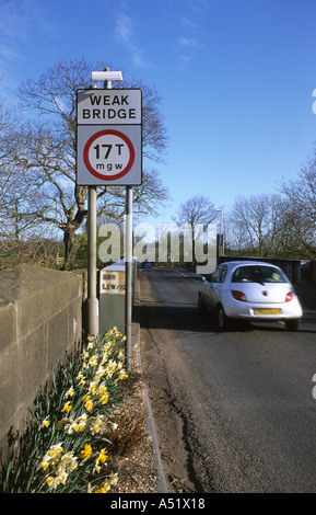 Weak bridge sign with warning of restricted traffic to 3 tonnes in ...