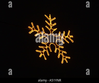 Neon light snow flake Stock Photo - Alamy