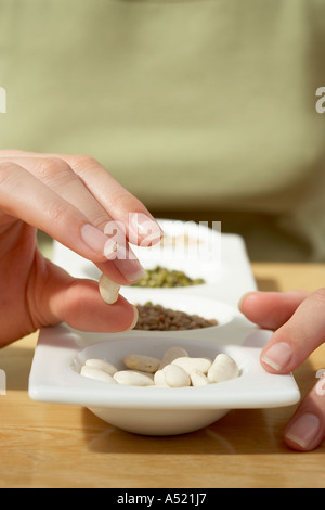 Woman hands holding green beans background Stock Photo - Alamy