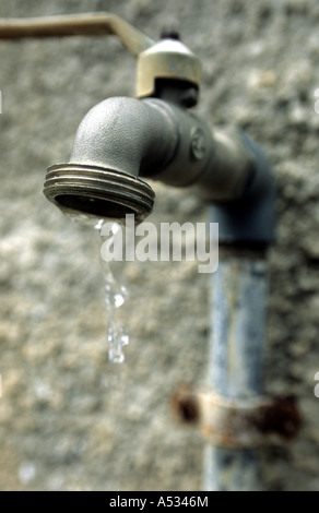 outside tap running water, wasting water, tilities, drought, water ...