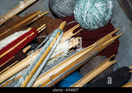 Balls of yarn and simple weaving shuttles in workshop Stock Photo - Alamy