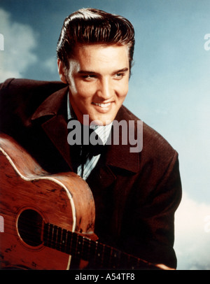 ELVIS PRESLEY American pop singer, guitarist and actor in musical films ...