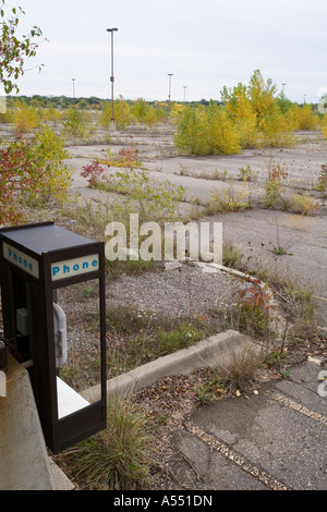 Overgrown Parking Lot of Closed Auto Factory Stock Photo - Alamy