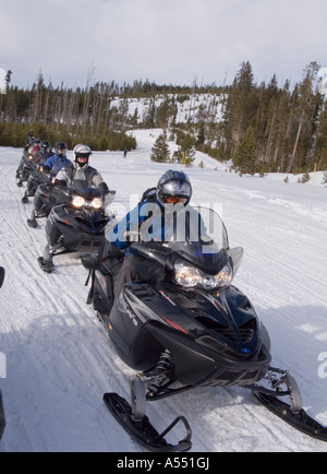 A snowmobile tour guide at Yellowstone National Park leads a winter ...