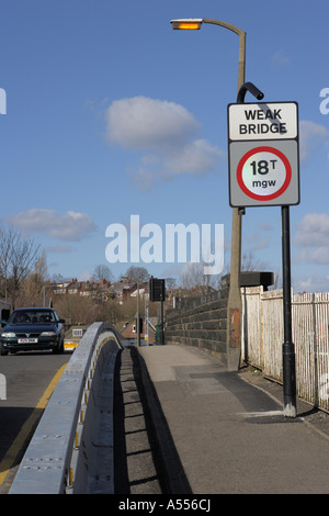 Weak bridge sign with warning of restricted traffic to 3 tonnes in ...