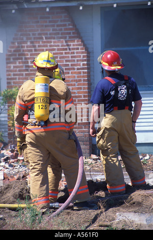 Firemen training for fighting fires Stock Photo - Alamy