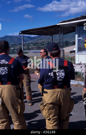 Firemen at fire training exercise for editorial Stock Photo - Alamy