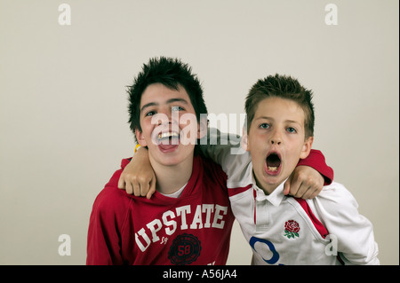 two brothers pose England Stock Photo - Alamy