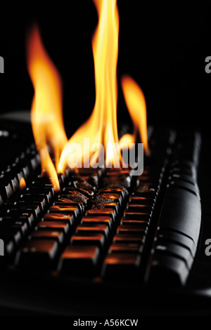 Computer keyboard burning Stock Photo - Alamy