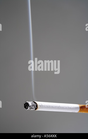 Burning cigarette, close-up Stock Photo - Alamy