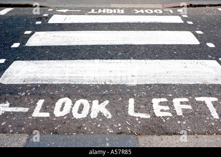Look left sign pedestrian crossing London UK Stock Photo - Alamy