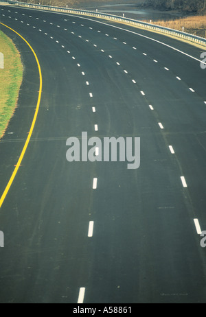 Empty four lane interstate highway with grass in the middle Stock Photo ...