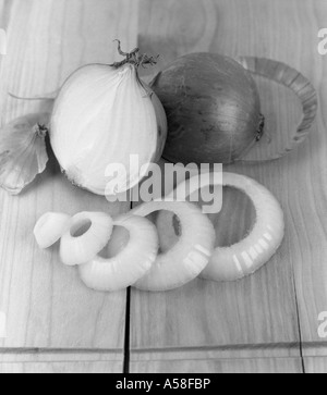 Onion peel or skin on wood background Stock Photo - Alamy