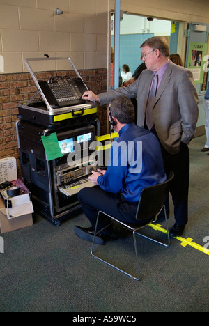 Television production editor edits video for broadcast Stock Photo - Alamy