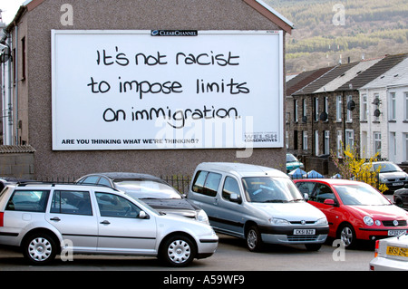 Conservative immigration election poster on the end of a terraced house ...