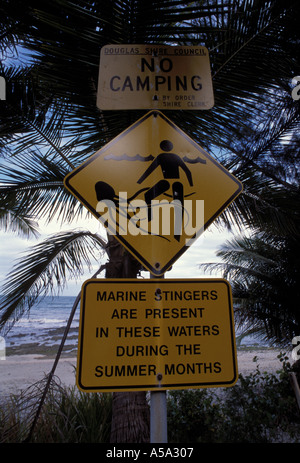 Warning sign for marine stingers such as box jellyfish on the idyllic ...