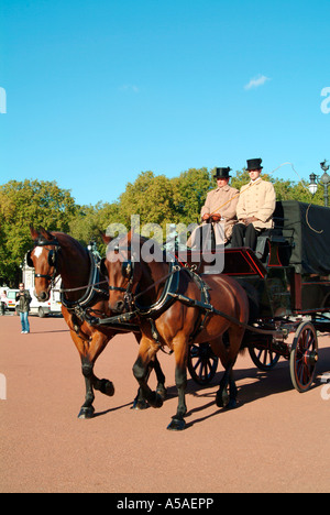 The Royal Mail coach delivering to Buckingham Palace London Stock Photo ...