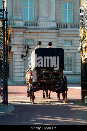 The Royal Mail coach delivering to Buckingham Palace London Stock Photo ...
