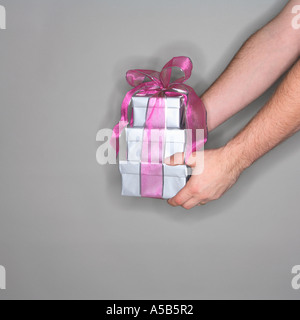 Christmas gift giving Stock Photo - Alamy