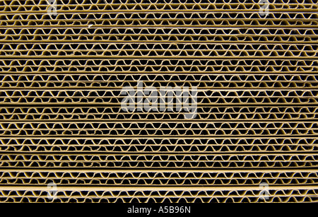 Cross section of stacked corrugated cardboard. stack of brown cardboard ...