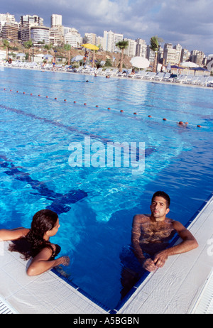 Guests at swimming pool of hotel, Beirut, Lebanon Stock Photo - Alamy