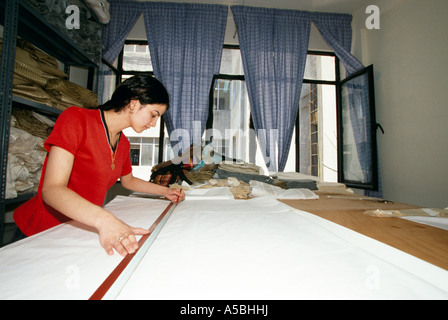 A woman working at a fabric factory Lebanon Stock Photo - Alamy