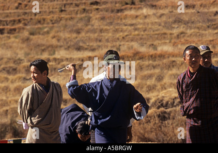 Men playing the popular game of darts Khuru in Bhutan Stock Photo - Alamy