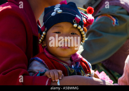 Ethnic Akha children wearing traditional clothes in tribal village near ...