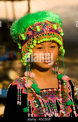 Festival, Hmong girl, dressed in traditional clothing, holding red ...