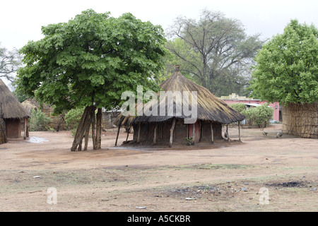 African mud huts thatched with straw Shona village recreation Zimbabwe ...