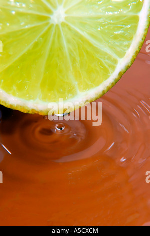 Green and red water dropping, water ripples in a pond. waves of ...