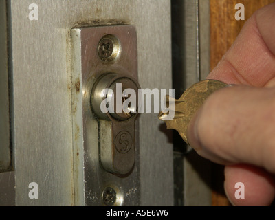 Door key snapped off in lock due to metal fatigue Stock Photo - Alamy