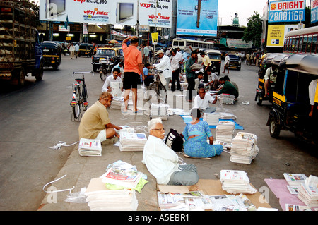 A newspaper seller in Bombay, India Stock Photo - Alamy