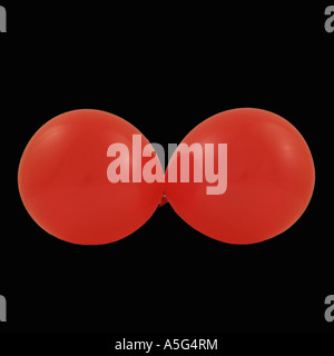 two balloons tied together representing linear shaped molecule Stock ...