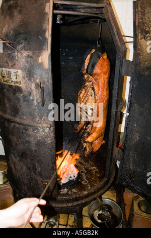 Hong Kong, China, suckling pig on a plate Stock Photo - Alamy