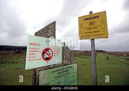 Danger sign near Whitford Point lighthouse on the Gower Peninsular near ...