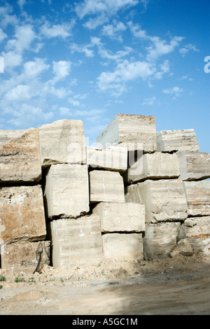 Travertine stone excavated from open mine quarry Stock Photo - Alamy