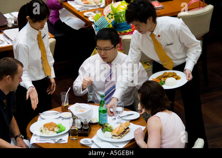 Chinese people, eating, waiter, waitress, table service, Chinese ...