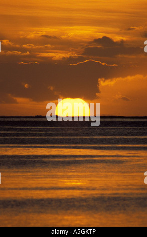 wonderful sunset in tahiti french polynesia beach Stock Photo - Alamy