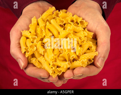 MAN HOLDING FIORELLI PASTA Stock Photo - Alamy