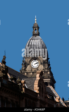 Leeds Town Hall clock tower pictured next to a 31 storey building under ...