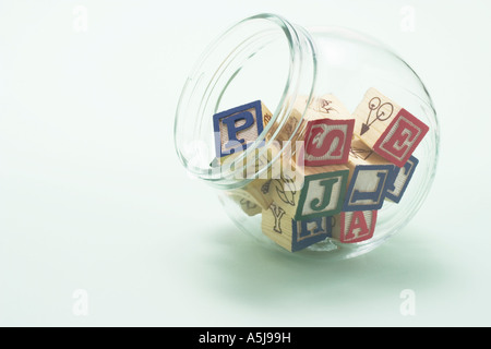 Alphabet Blocks in Glass Jar Stock Photo - Alamy
