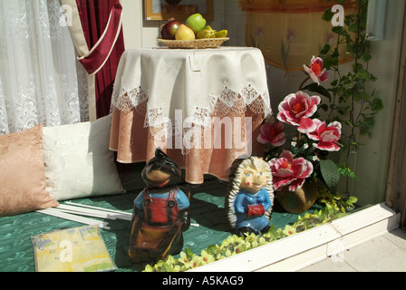 Eastgermany, GER, Germany: Tasteless shop window with different figures ...