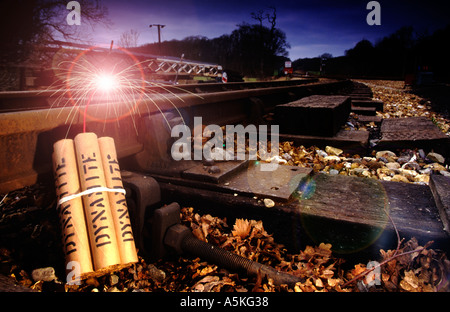 dynamite with fuse against railway track Stock Photo - Alamy