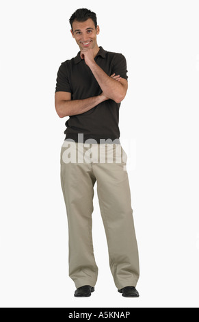 Full body shot of man thinking and looking away ready for winter Stock ...